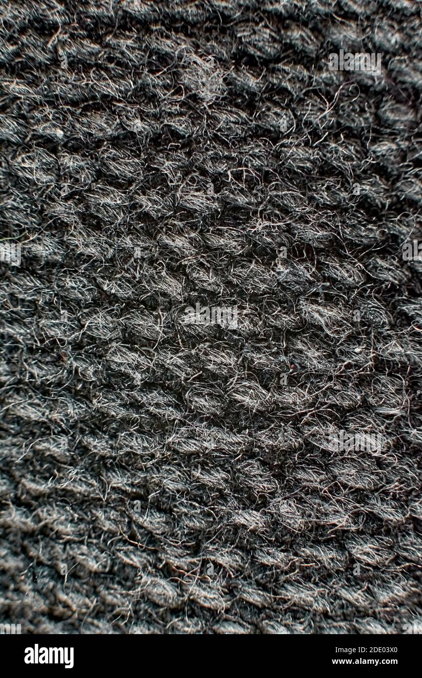 A vertical closeup shot of a gray rough carpet surface Stock Photo - Alamy