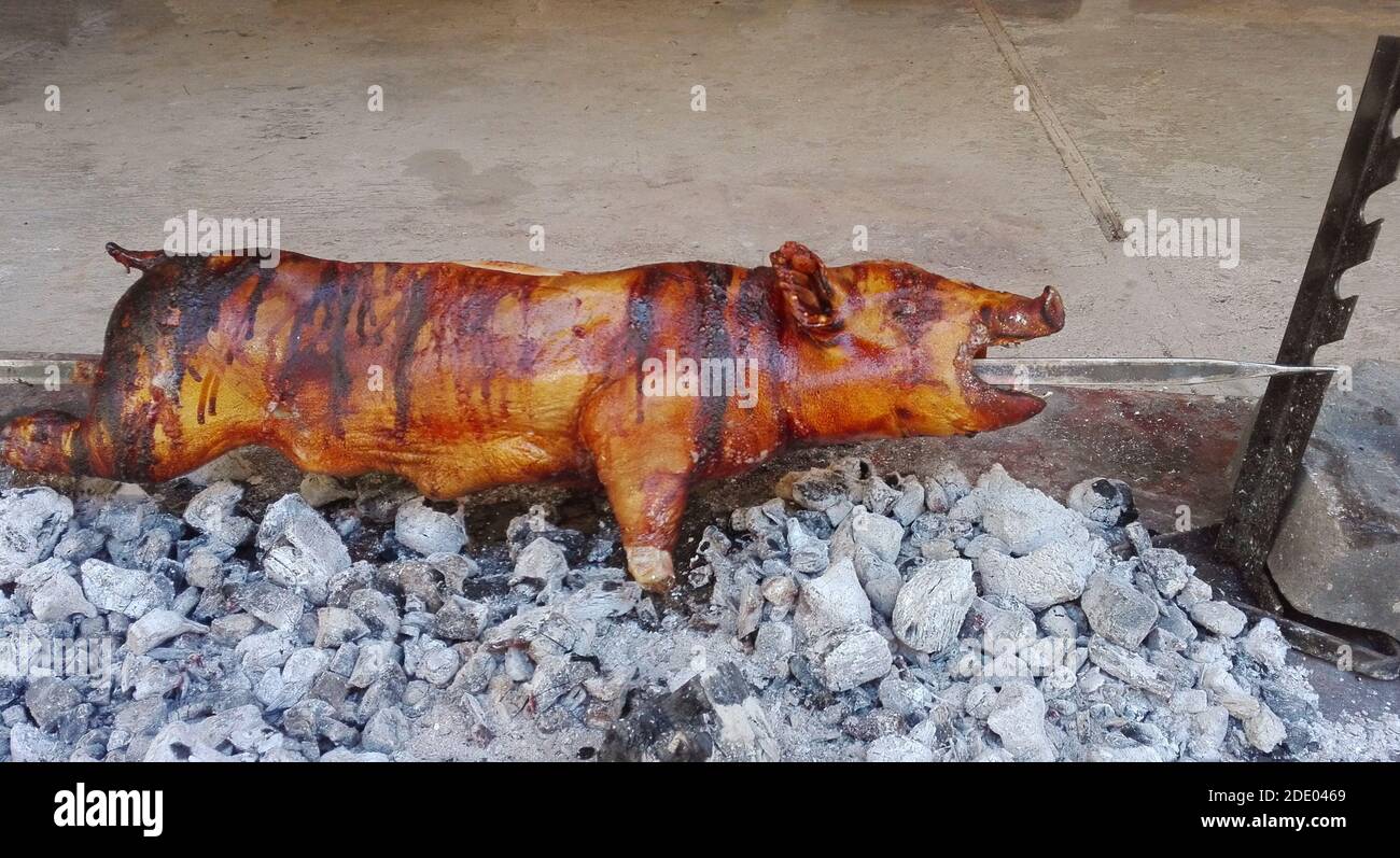 Pig On Spit Hog Roast High Resolution Stock Photography and Images - Alamy