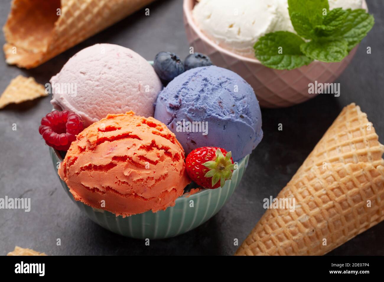 Berry and vanilla ice cream sundae. Top view flat lay with copy space ...