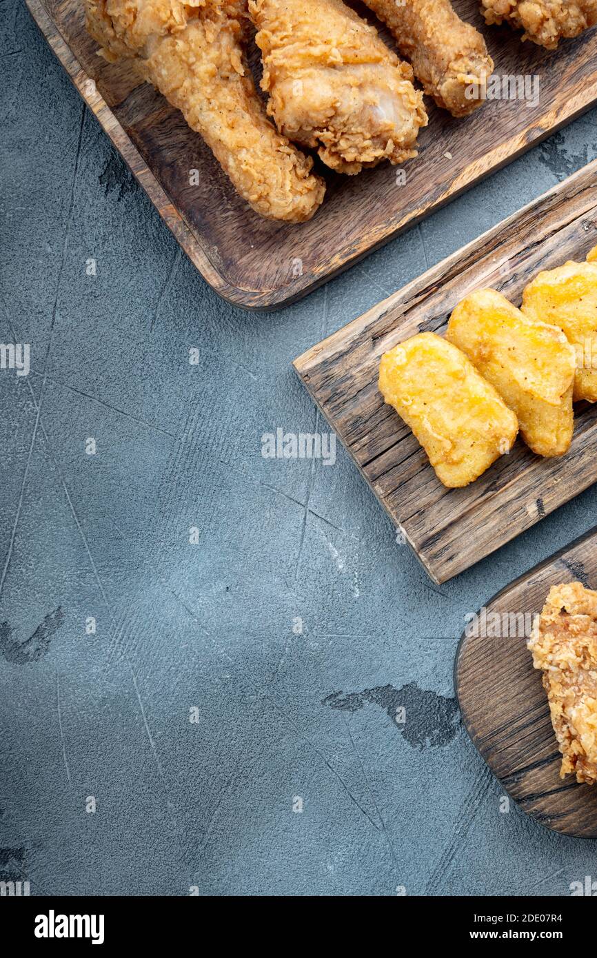 Crispy fried chicken on grey background, top view, with copy space ...