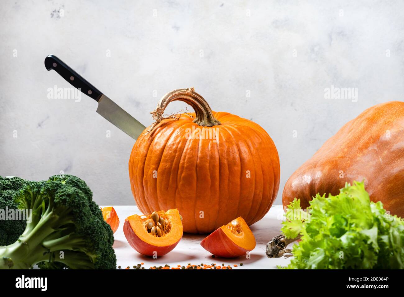 Pumpkin with knife hi-res stock photography and images - Alamy