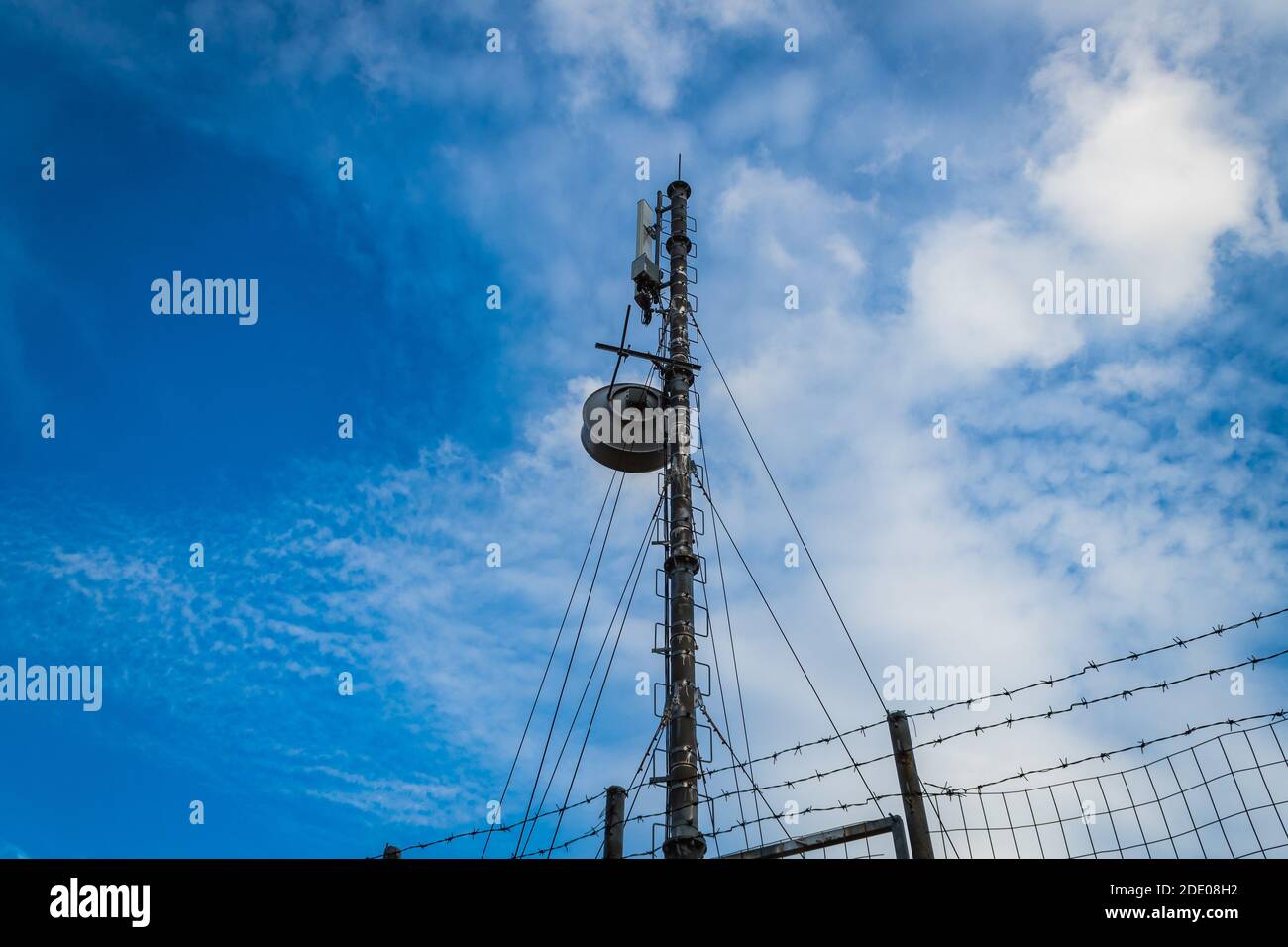 Cell tower viewed from below Stock Photo - Alamy