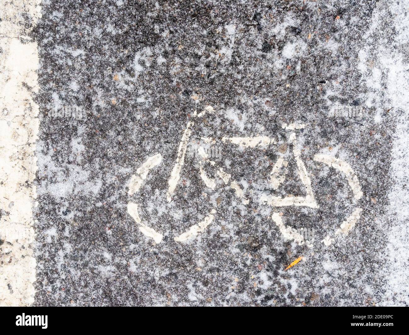 top view of ice-covered bicycle lane in city after freezing rain on cold autumn day Stock Photo ...