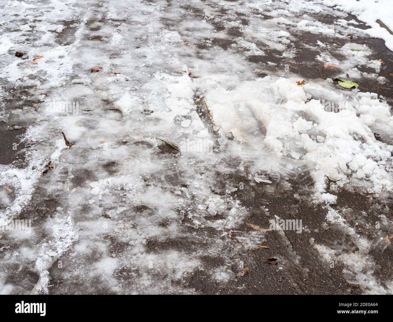 Ice melting on pavement road hi-res stock photography and images - Alamy