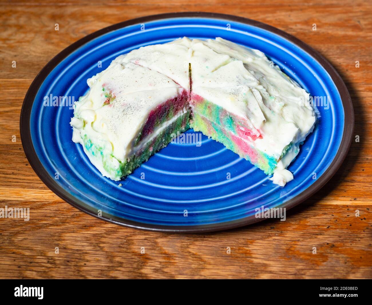 cooking sweet sponge cake at home - cutted homemade colorful sponge ...