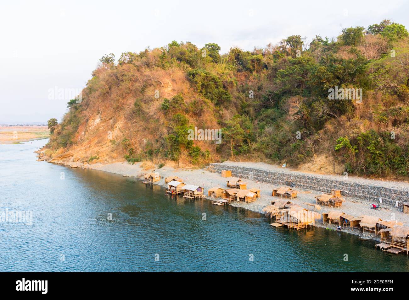 River cottages dot the Abra River where people go for a swim and some ...