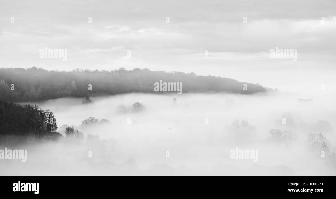 Early morning mist rolling through English countryside Stock Photo - Alamy