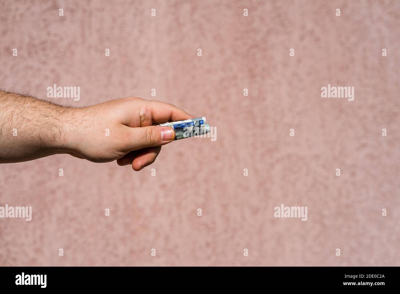 Hand holding showing dollars money and giving or receiving money like ...