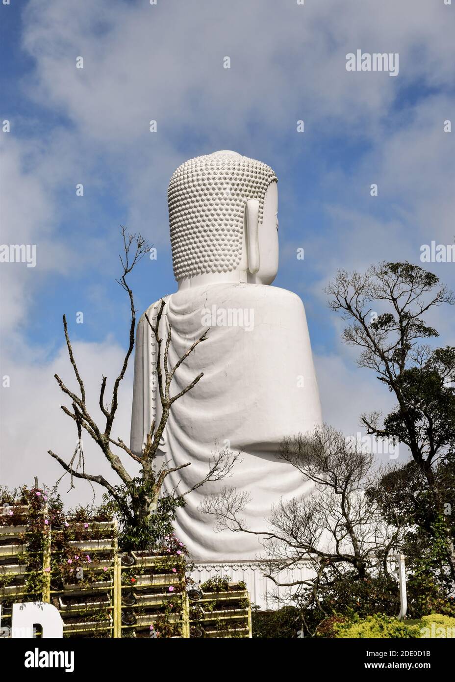 BA NA HILLS, VIETNAM - DECEMBER 22, 2019: Back view of a huge statue of ...