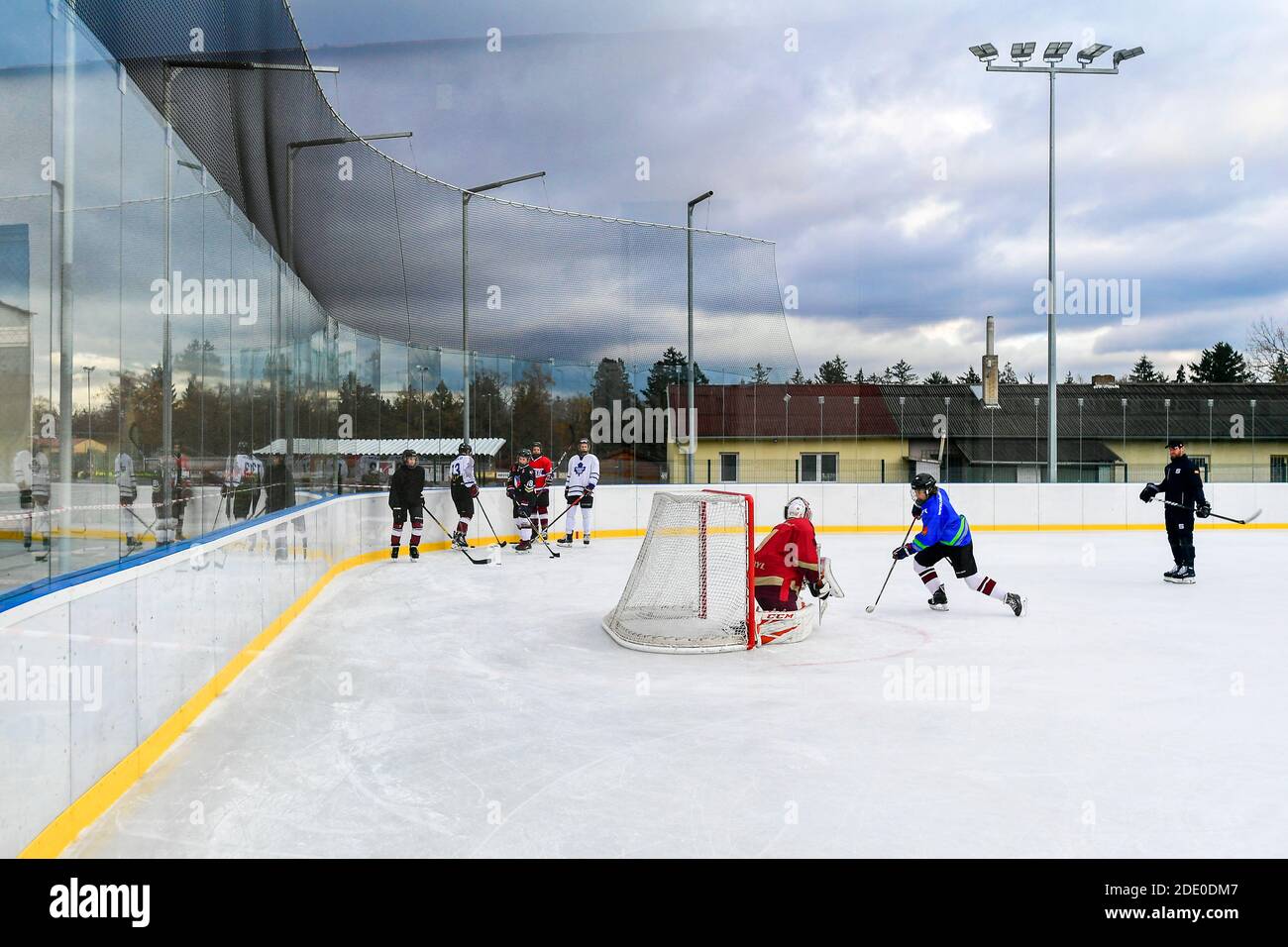 open air ice-hockey training of youngsters Stock Photo - Alamy