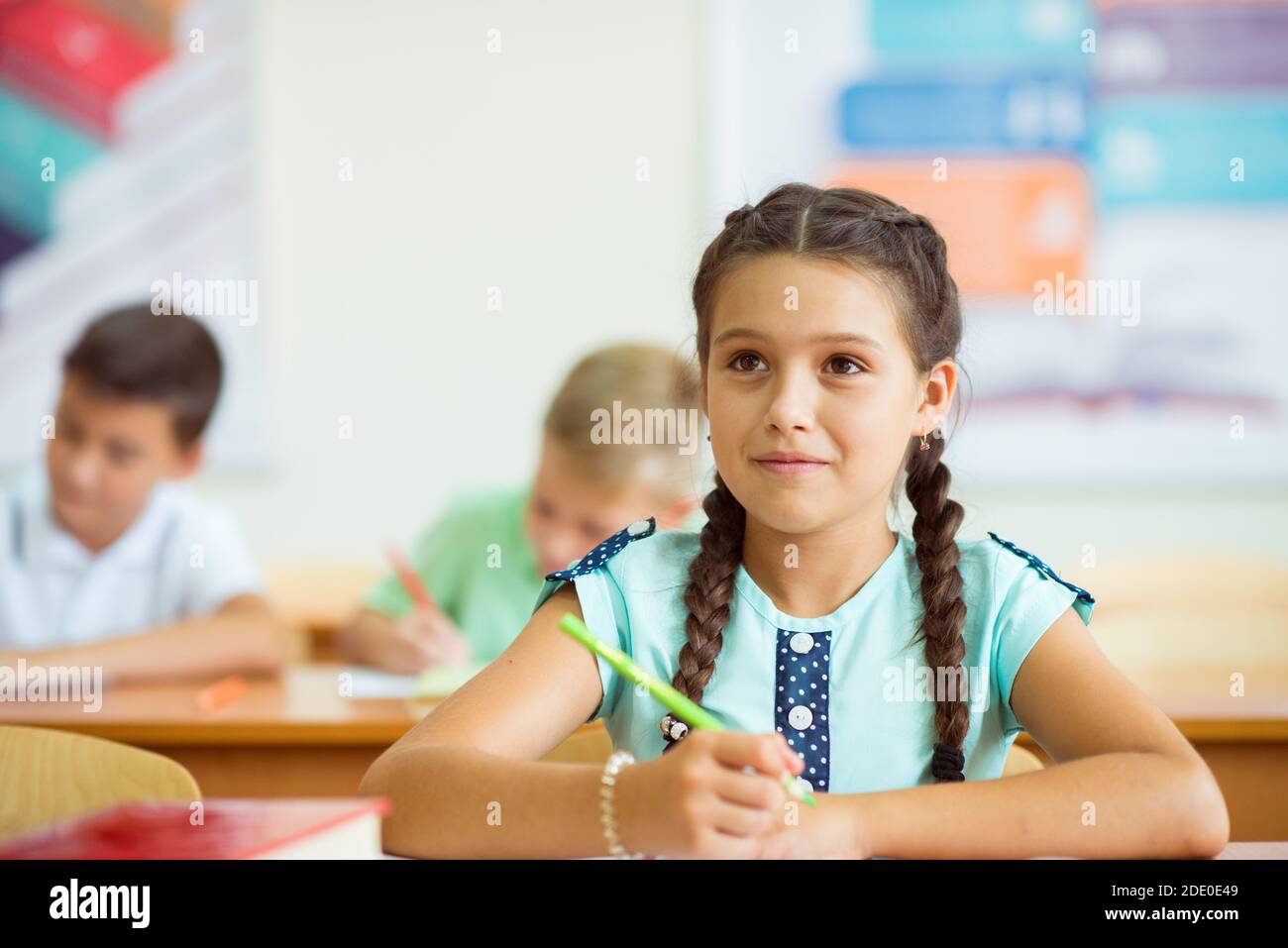 Portrait of children studying in classroom at the school Stock Photo ...