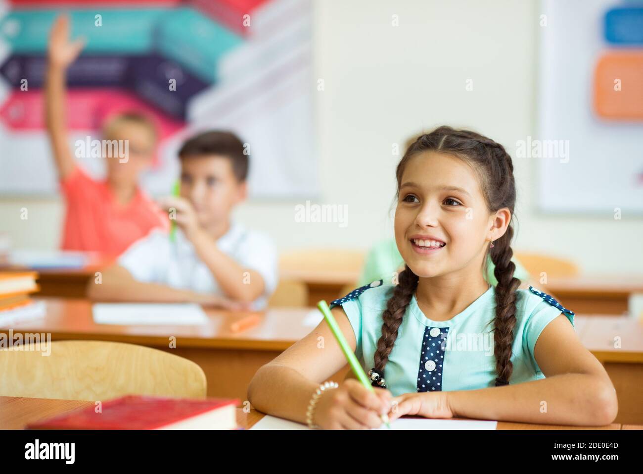 Portrait of children studying in classroom at the school Stock Photo ...