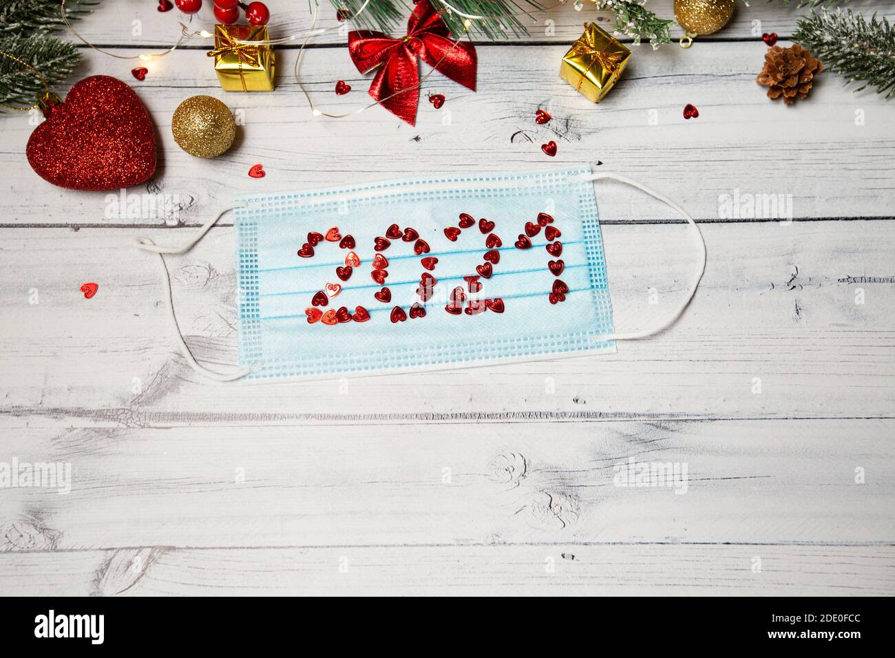 medical mask with numbers 2021 and Christmas decorations Stock Photo ...