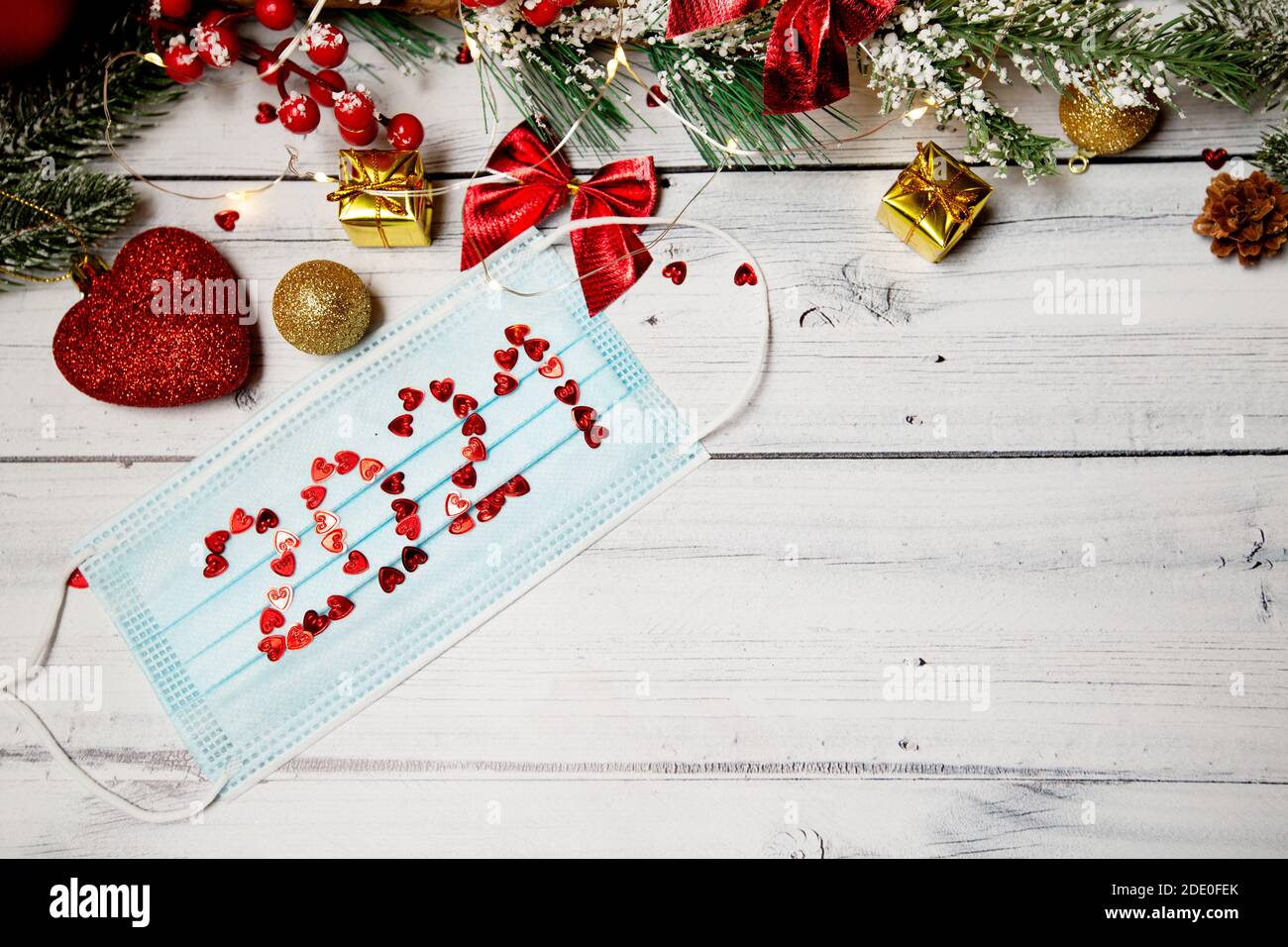 medical mask with numbers 2021 and Christmas decorations Stock Photo ...