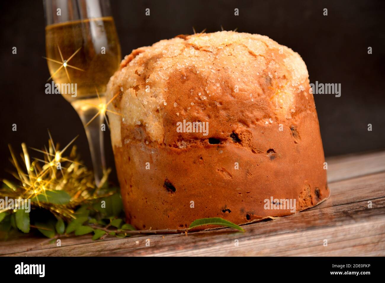 italiann panettone traditional christmas dessert and glass of spumante ...