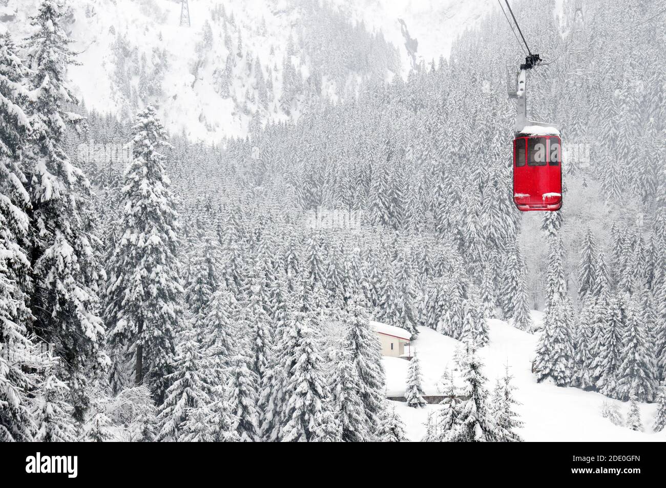 Cable car in winter alpine landscape Stock Photo - Alamy