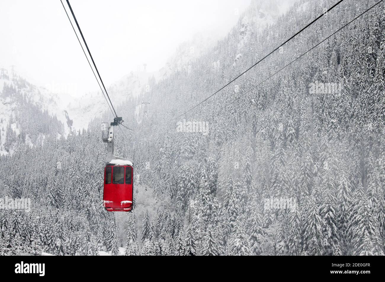 Cable car in winter alpine landscape Stock Photo - Alamy