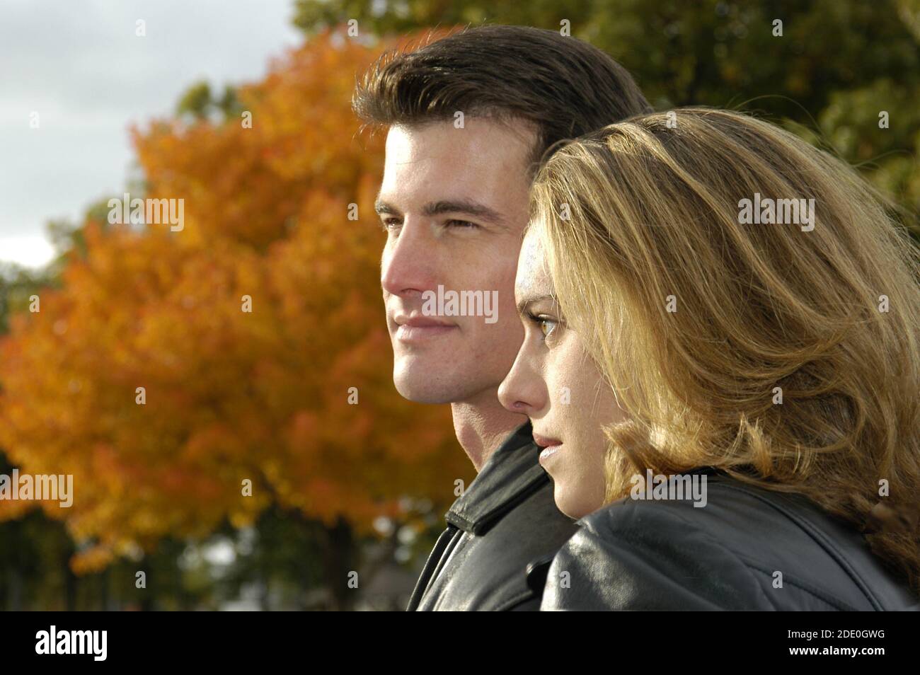 Young adult male and female couple in a loving passionate relationship ...