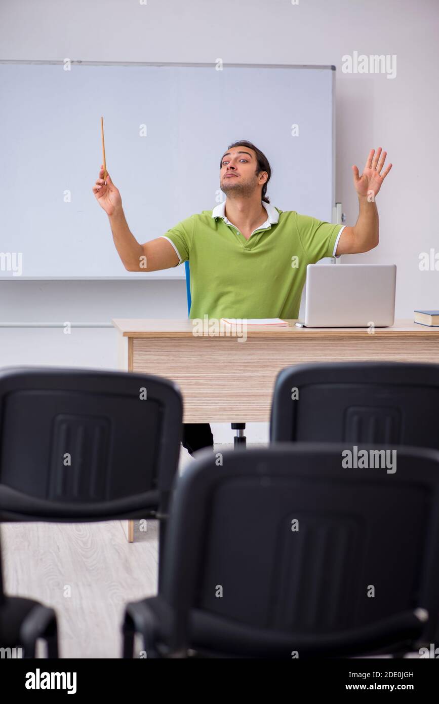 Young student in business presentation concept Stock Photo - Alamy