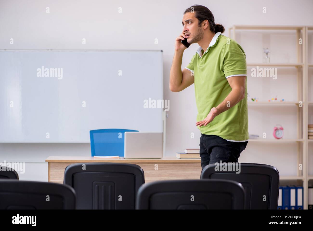 Young student in business presentation concept Stock Photo - Alamy