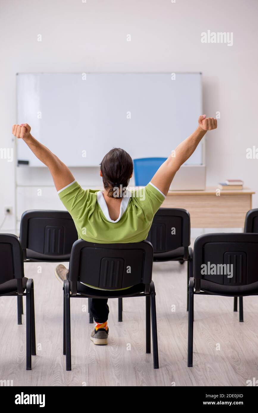 Young student in business presentation concept Stock Photo - Alamy