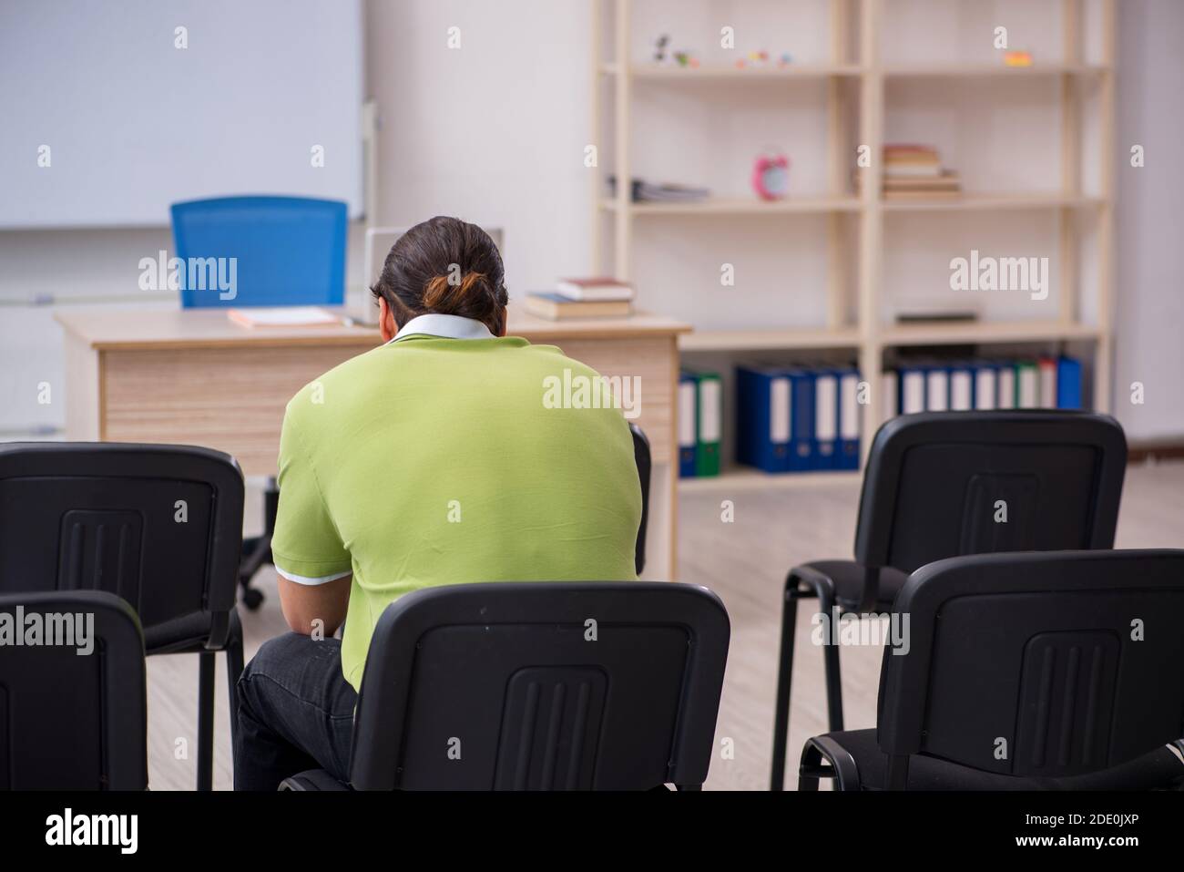 Young student in business presentation concept Stock Photo - Alamy