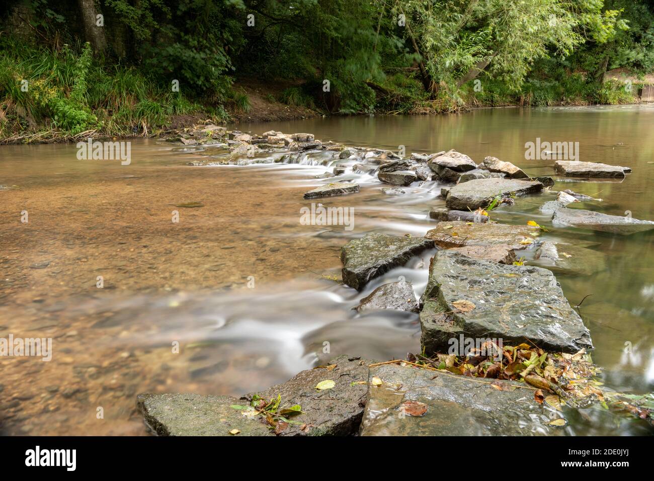 Long exposure of the River Brue flowing through the weir at West ...