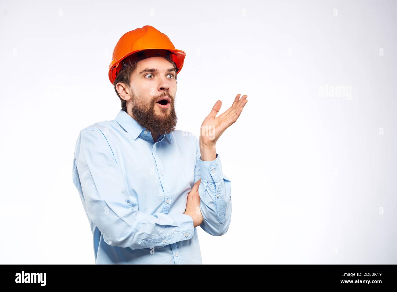 Worker man in orange paint engineer emotions industry construction ...