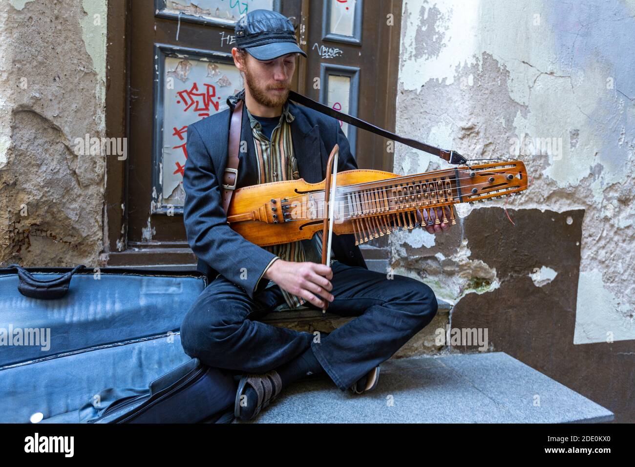 Music street man playing a nyckelharpa hi-res stock photography and ...