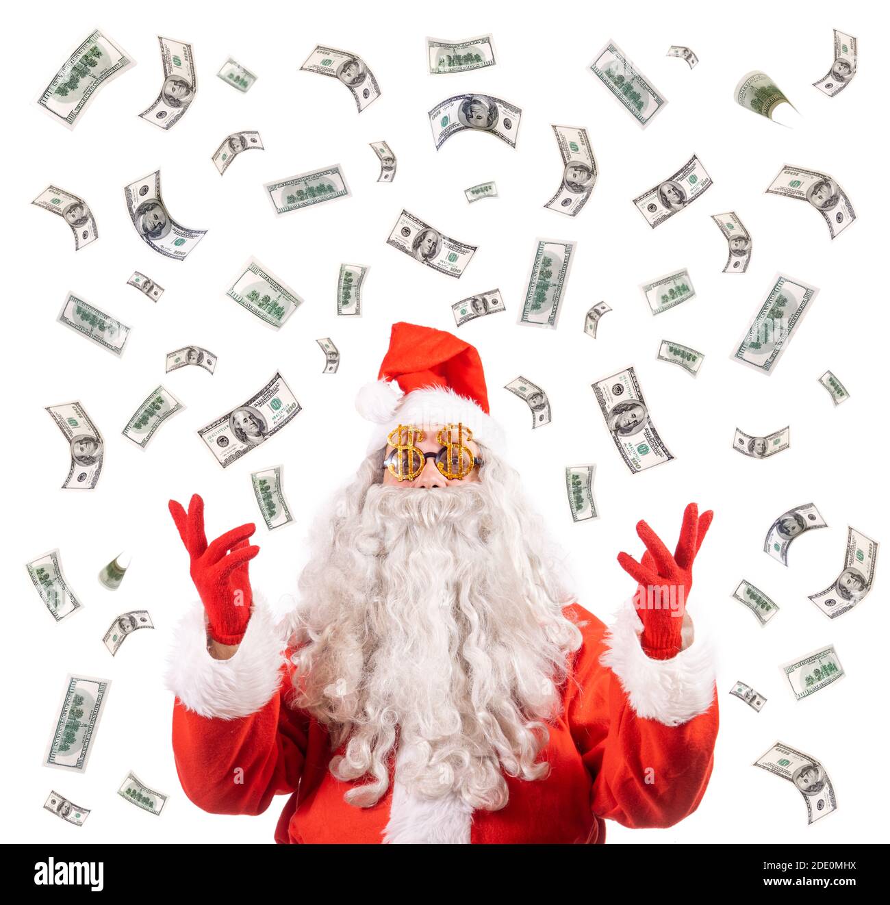 Santa Claus is under the rain of dollars bills, isolated on a white ...