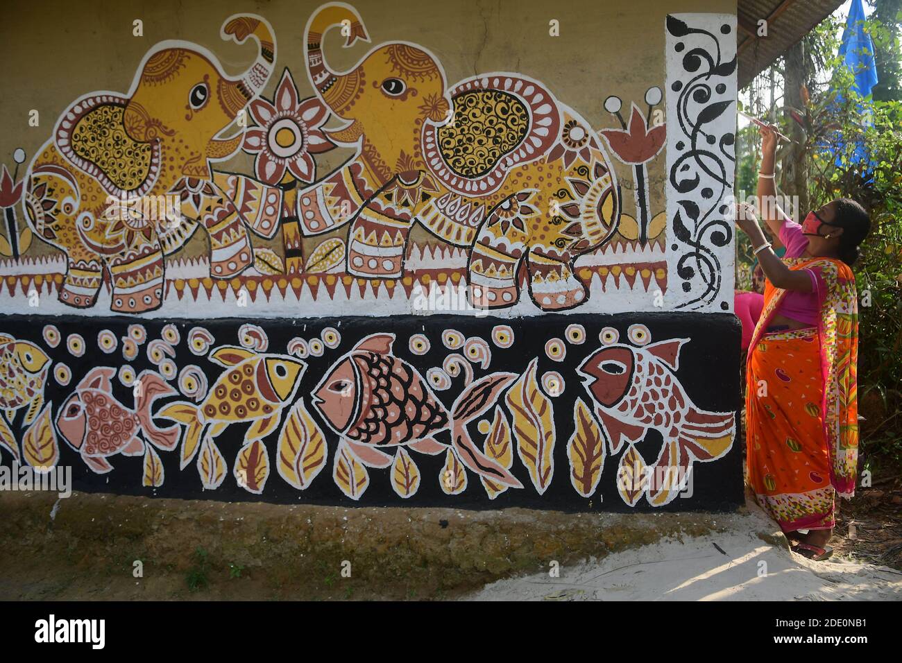 The artisans are doing wall paintings under the observation of Artists ...