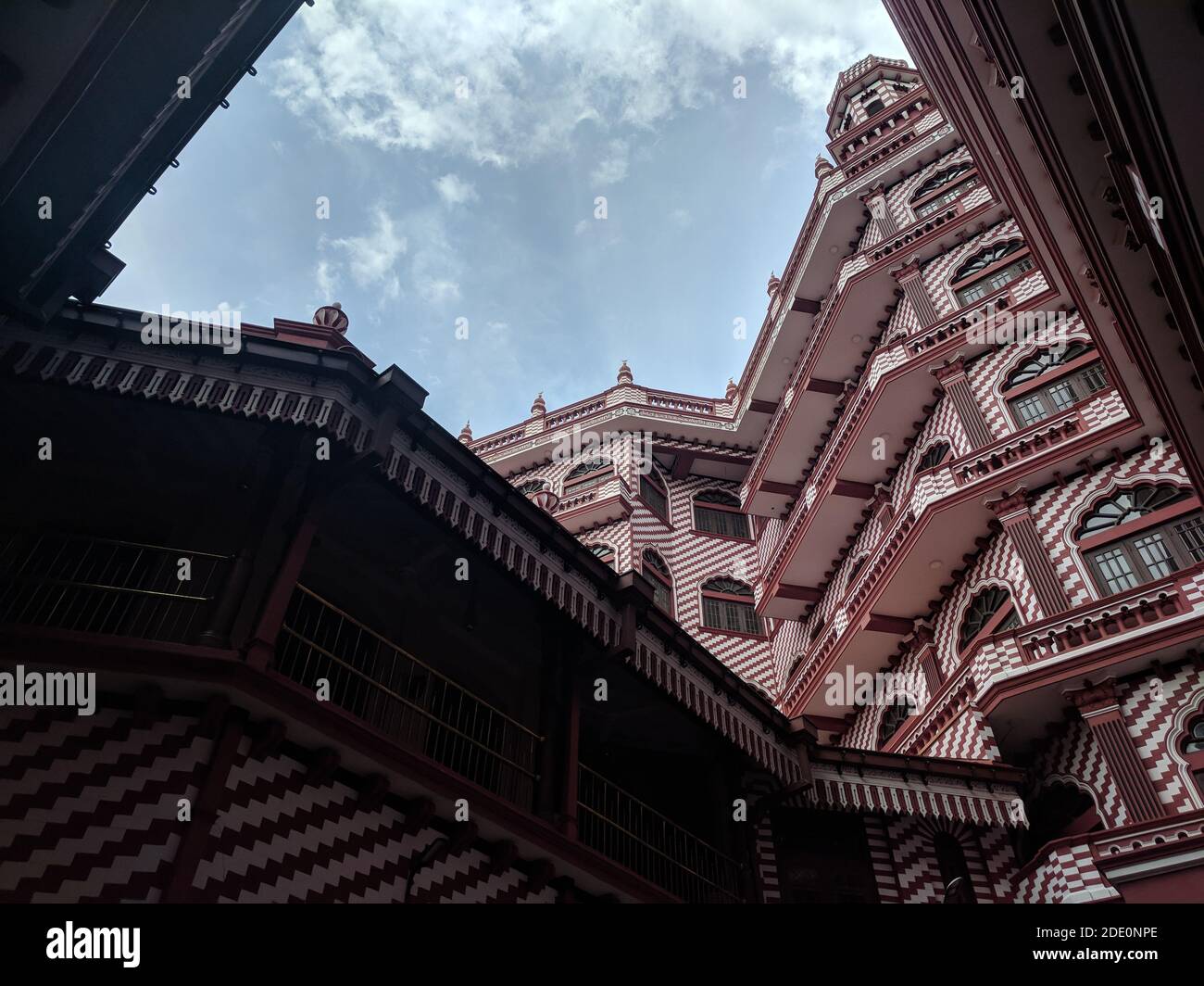 A low angle view of the beautiful Red Masjid temple located in Colombo ...