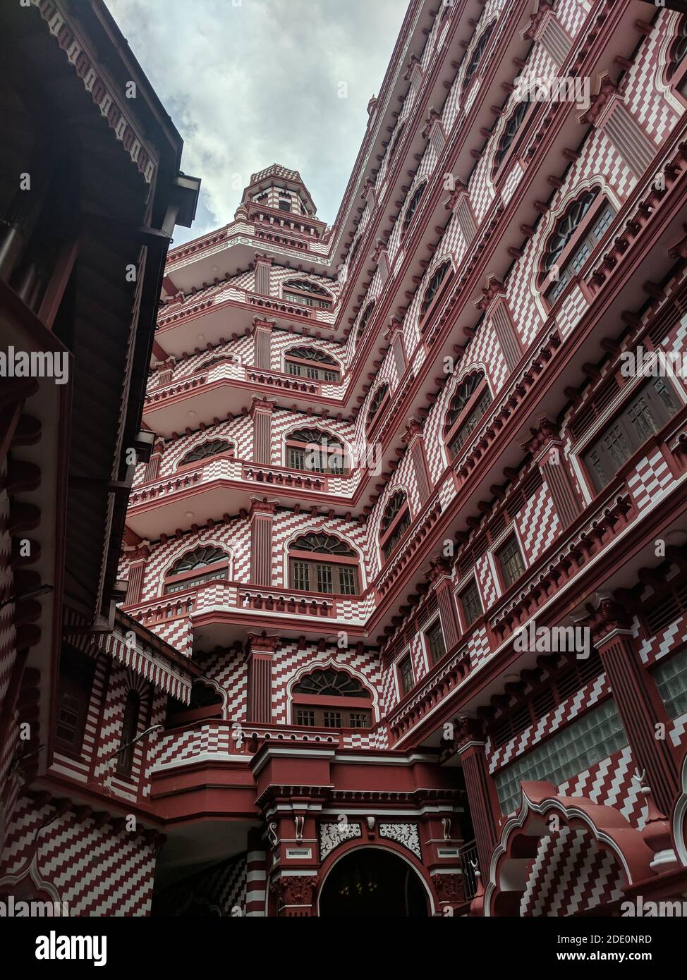 A low angle view of the beautiful Red Masjid temple located in Colombo ...