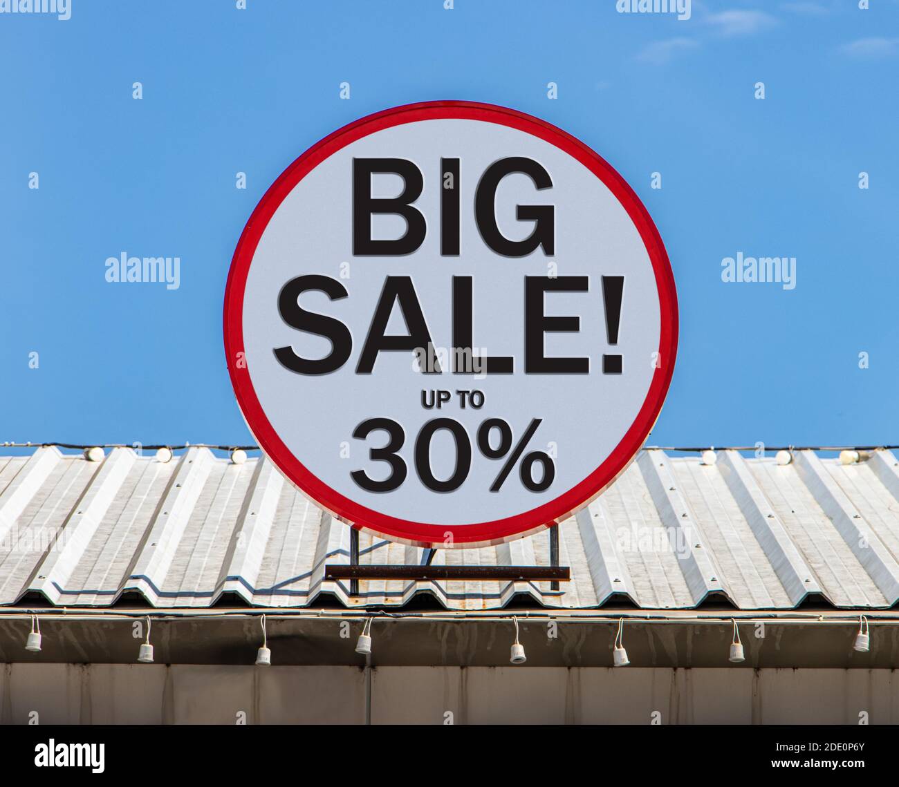 A Circle billboard with text shows BIG SALE is installed on a roof ...