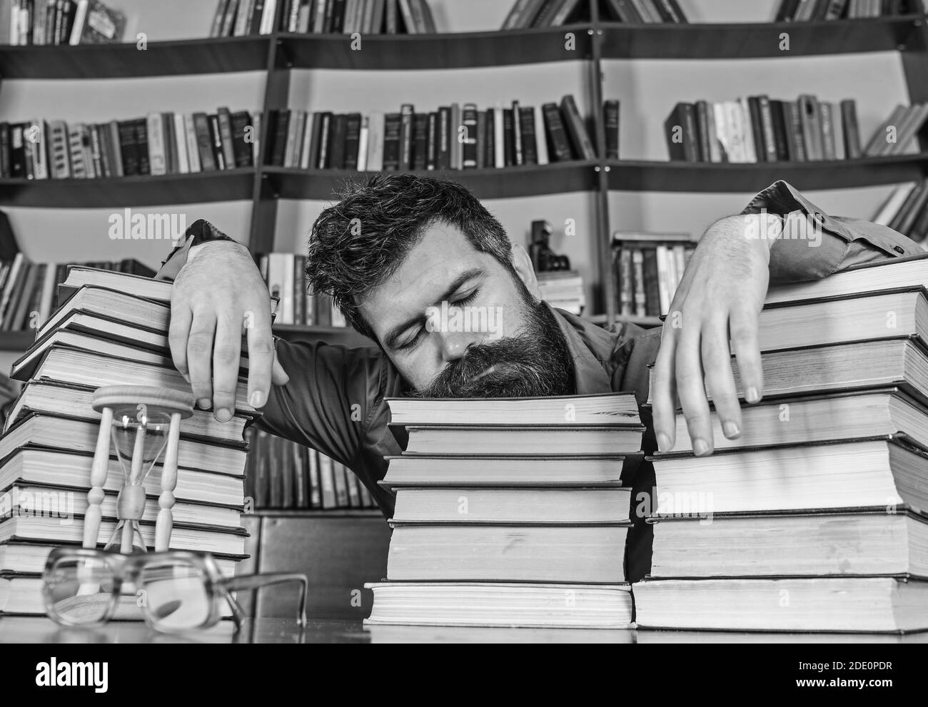 Man sleeping book on face hi-res stock photography and images - Alamy