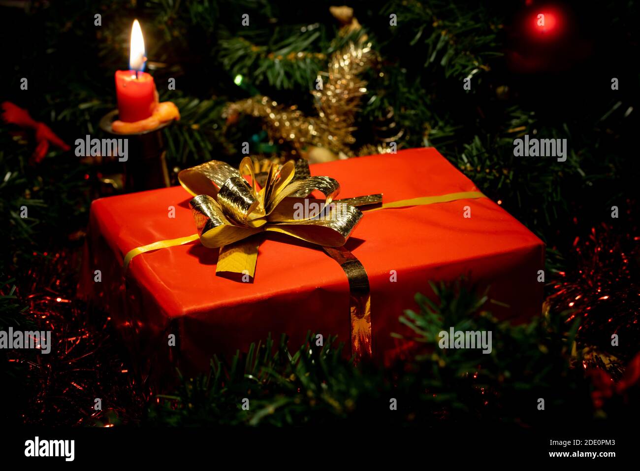 The small Christmas box with a bow, a background of the Christmas ...