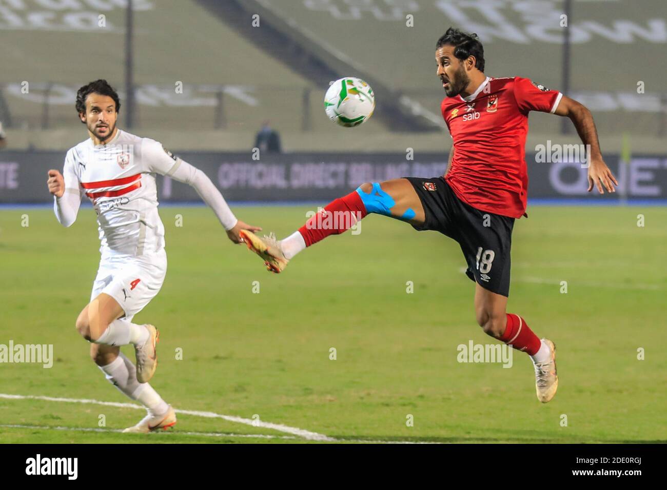 Cairo, Egypt. 27th Nov, 2020. Al Ahly's Marwan Mohsen (R) and Zamalek's Mahmoud Alaa in action ...