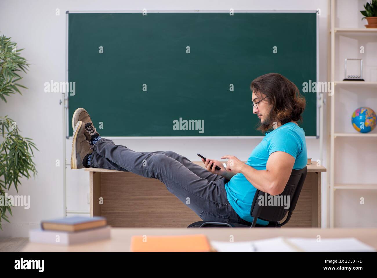 High school student texting in class hi-res stock photography and ...