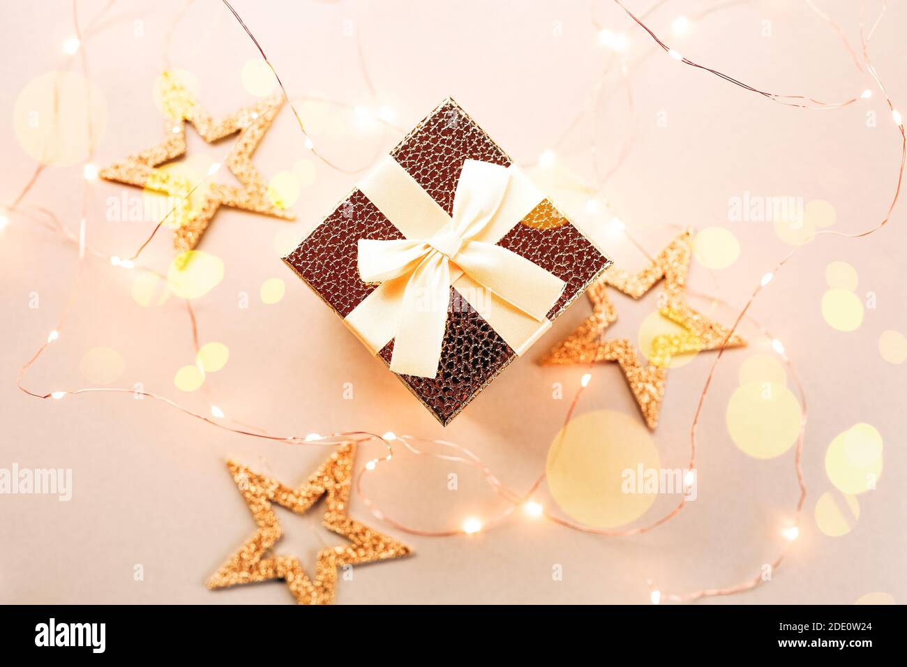 Christmas gift box with ribbons Stock Photo - Alamy