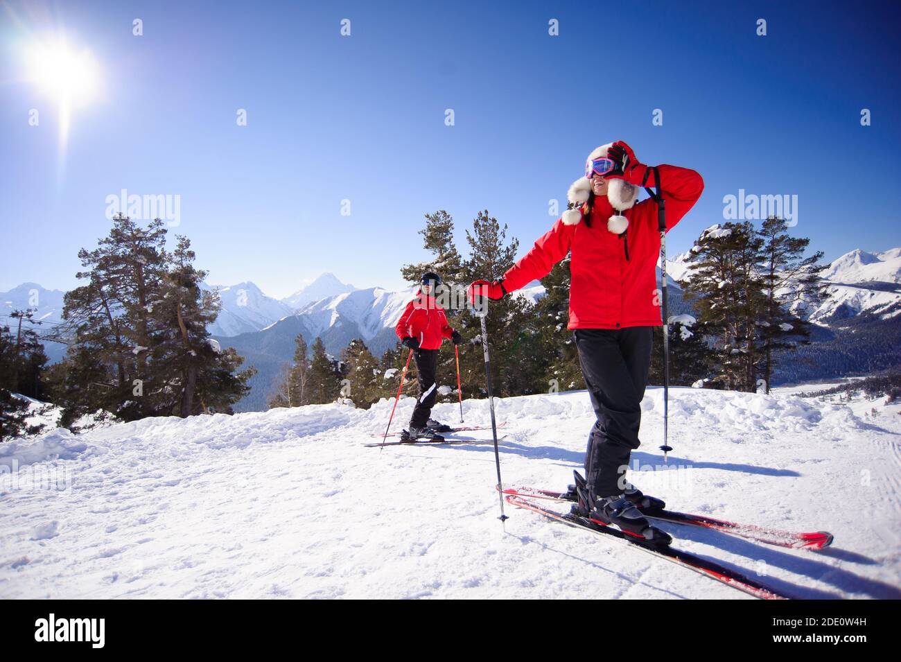 people ski Alpine mountains with white snow and blue sky Stock Photo ...