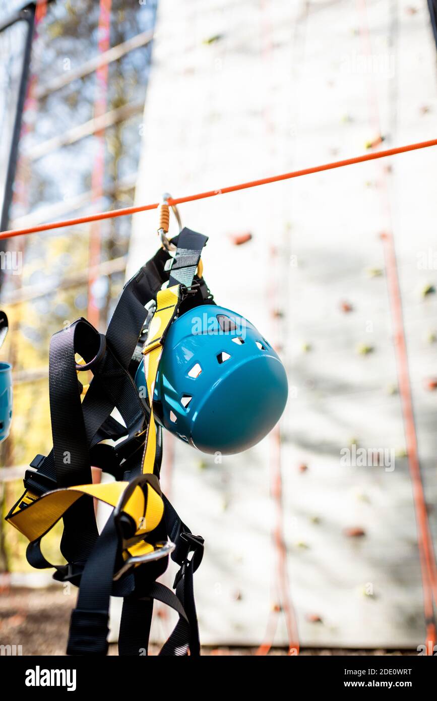 Climbing equipment hanging on the rope at amusement park outdoors Stock ...