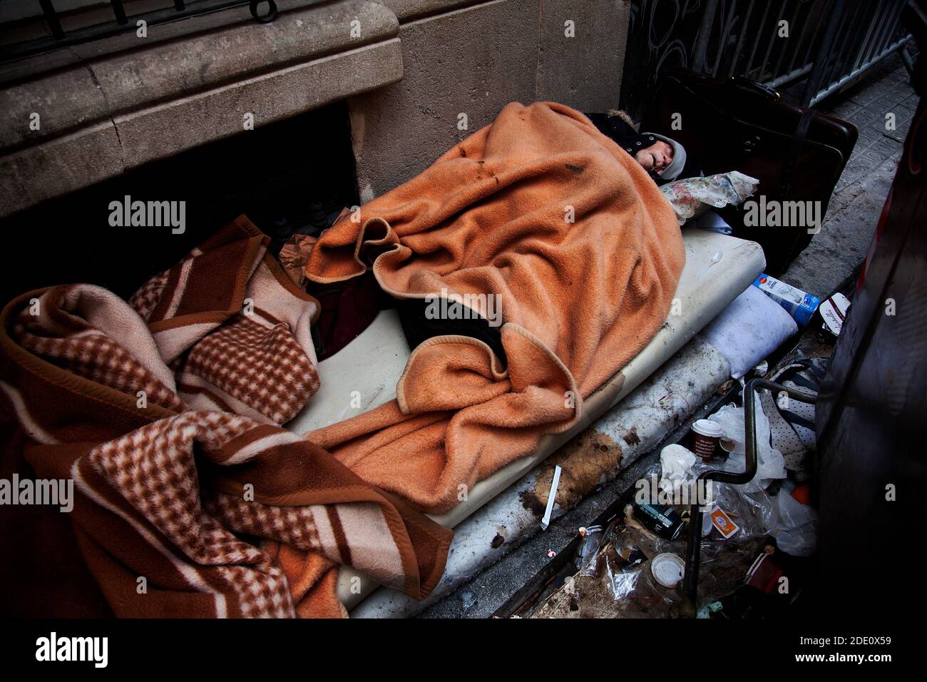 Homeless man sleeping, Barcelona, Spain Stock Photo - Alamy