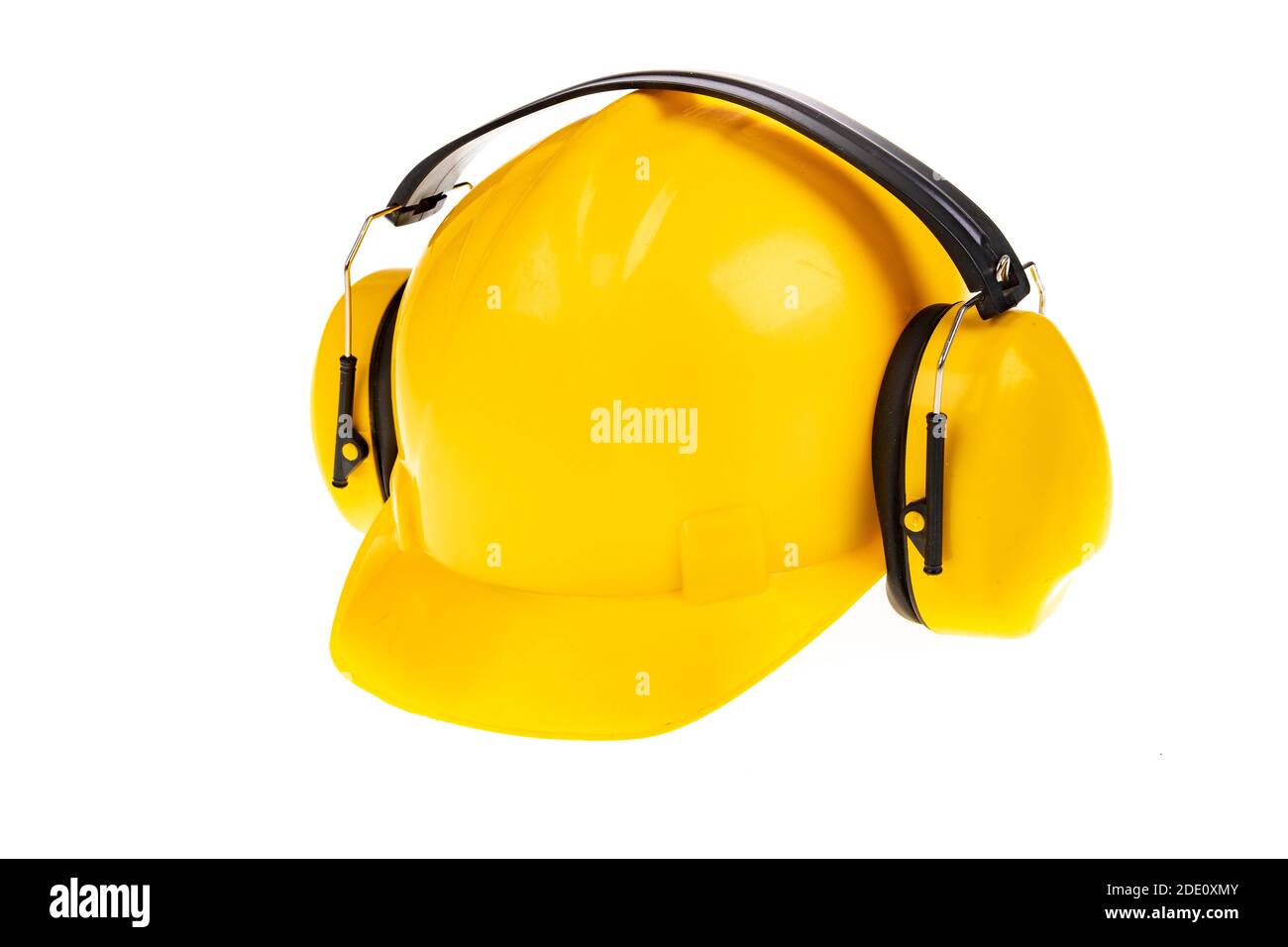 Yellow hard hat for construction workers. Protective clothing and ...