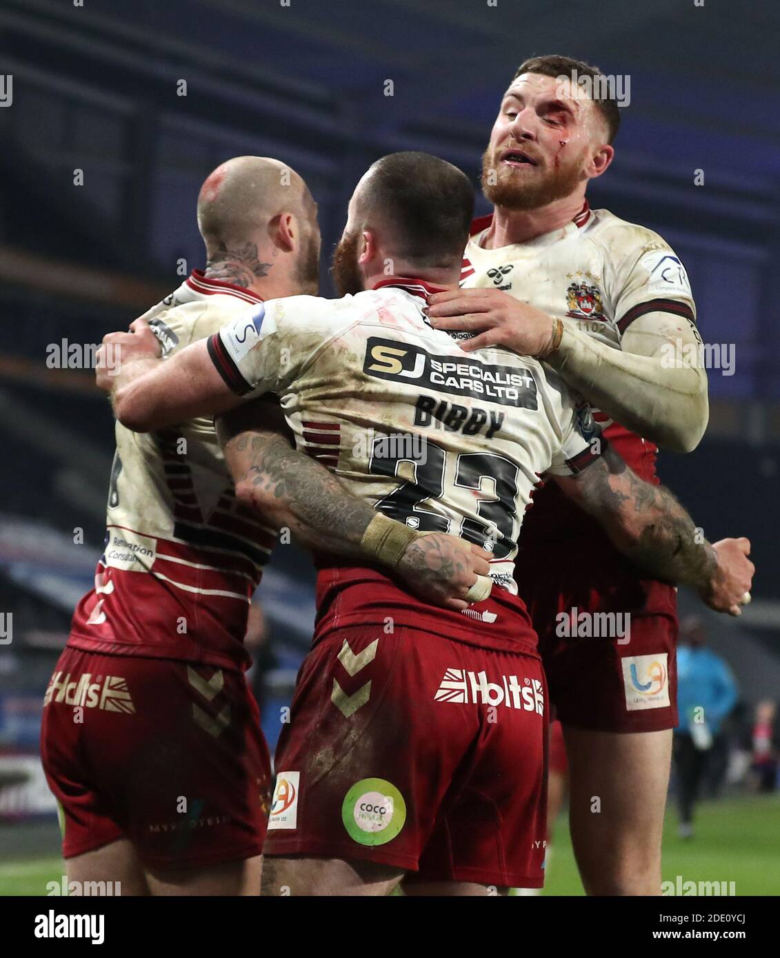 Wigan Warriors Jake Bibby (centre) celebrates scoring his sides first ...