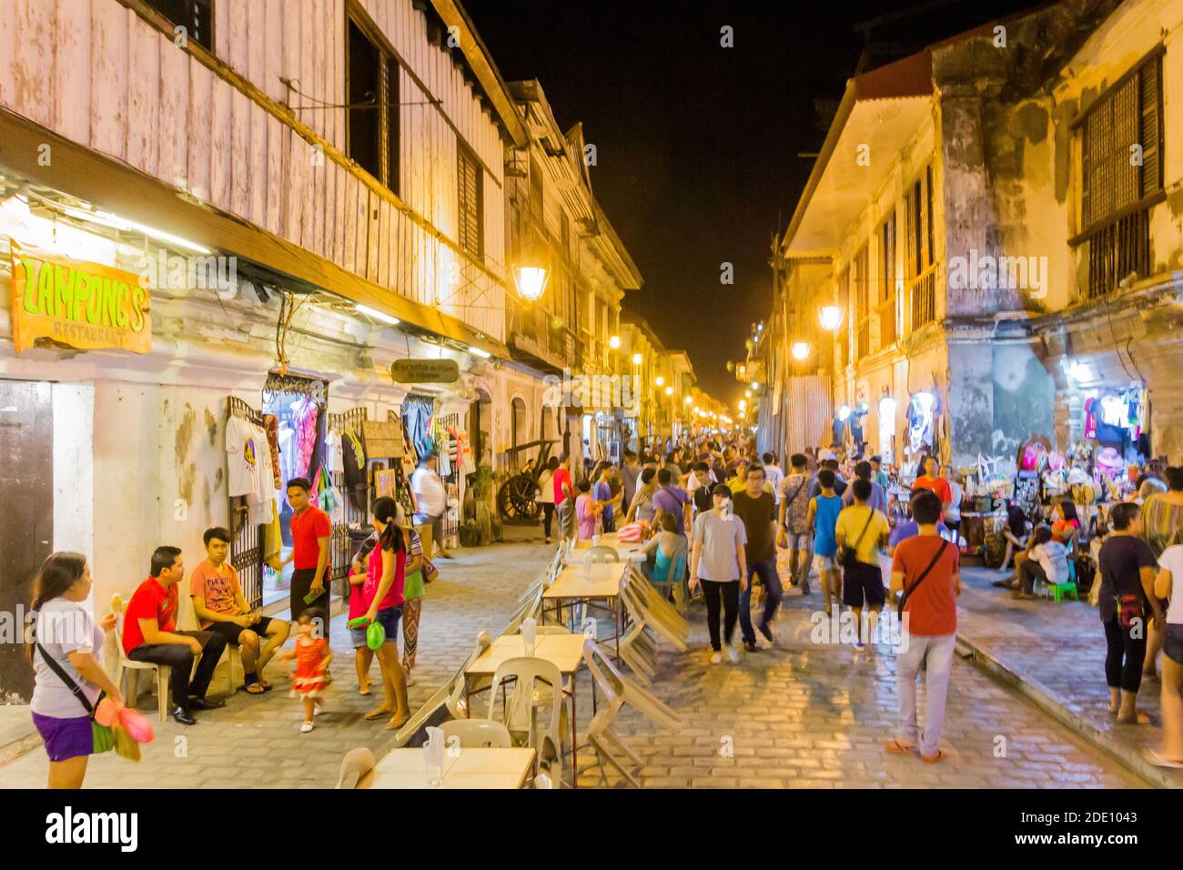 Tourists at night at Calle Crisologo in Vigan City, Philippines, a ... Tourists at night at Calle Crisologo in Vigan City, Philippines, a ...