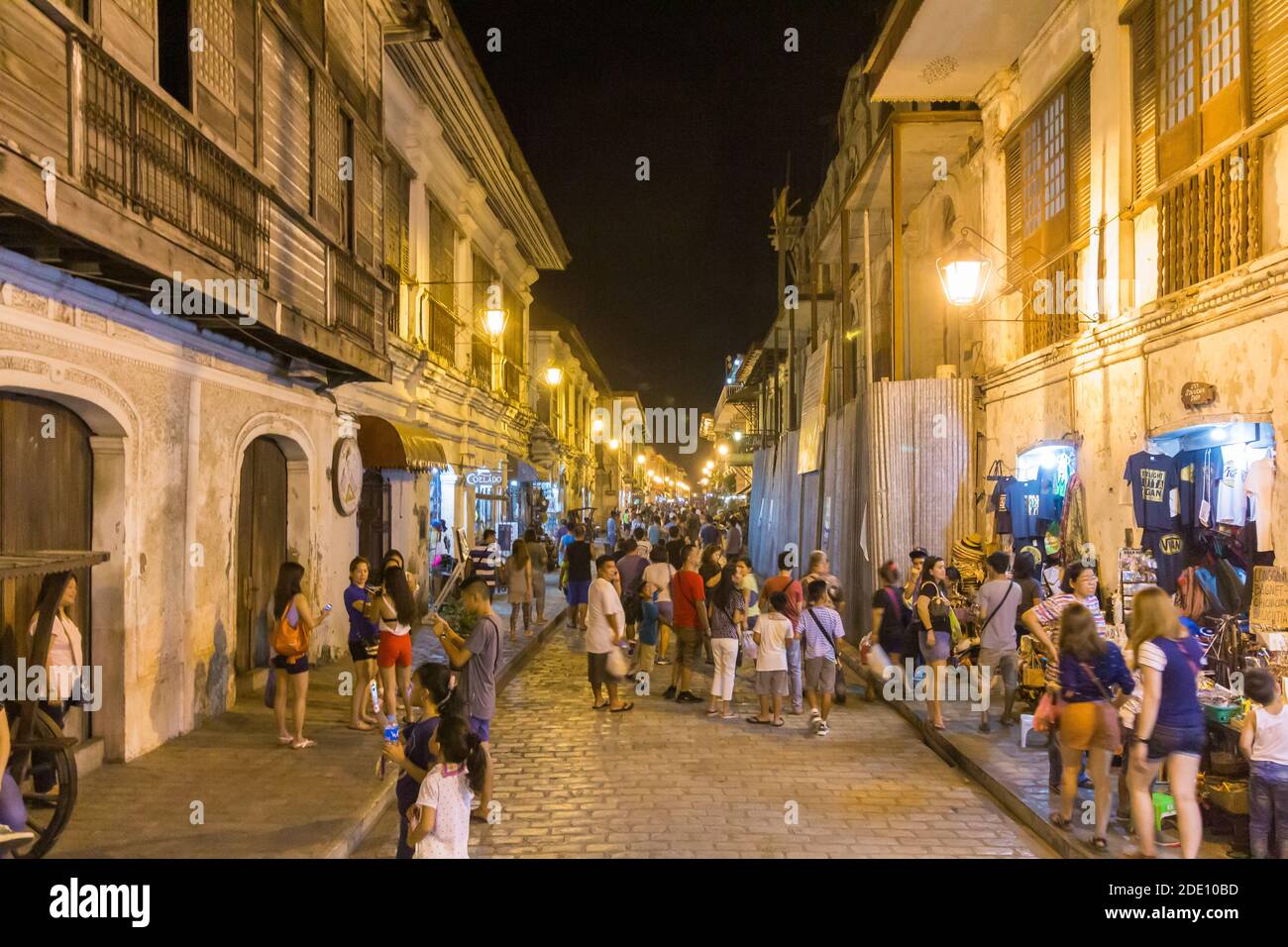 Tourists at night at Calle Crisologo in Vigan City, Philippines, a ... Tourists at night at Calle Crisologo in Vigan City, Philippines, a ...
