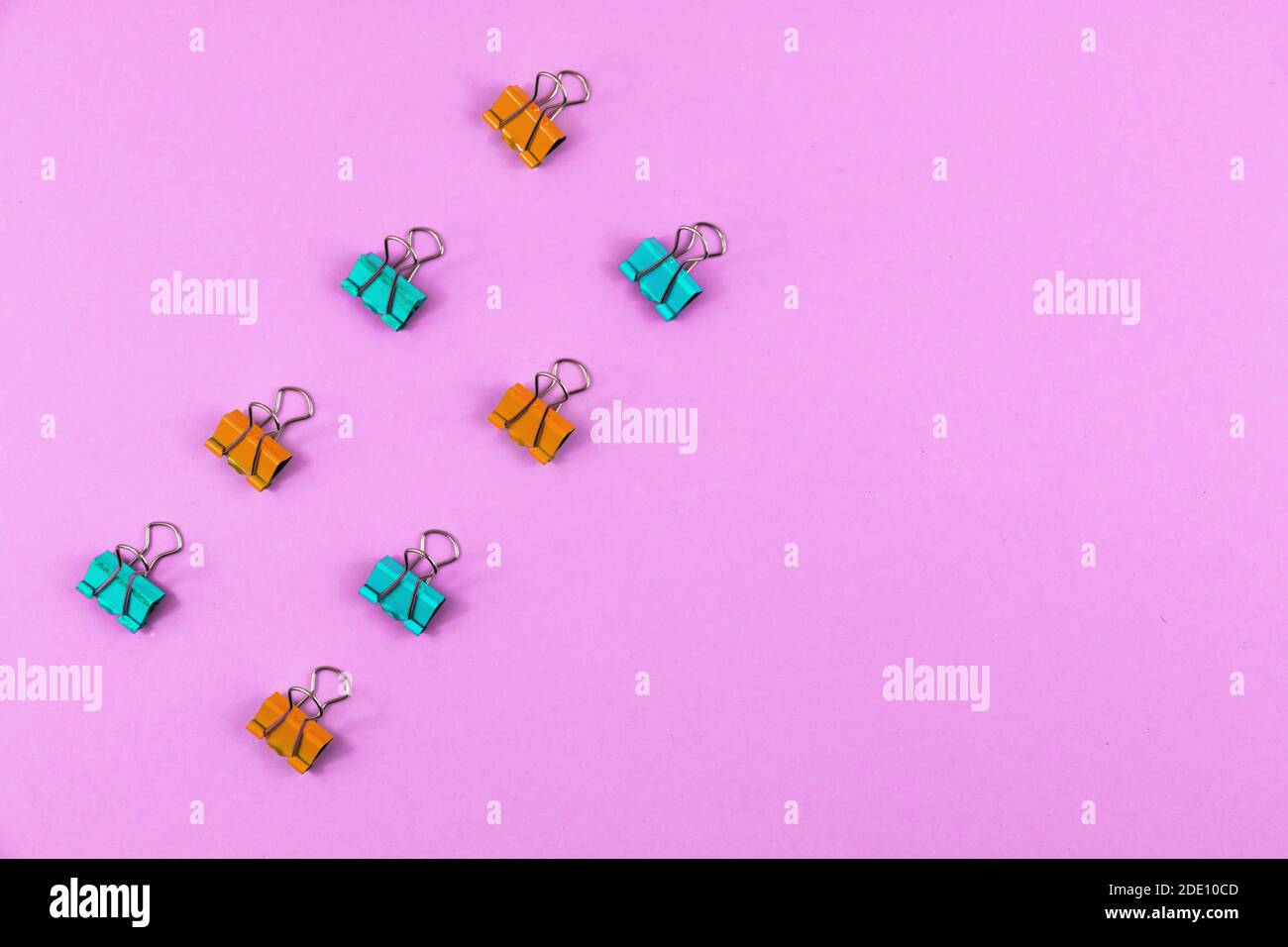 Office supplies on bright beautiful pleasant backgrounds, paper clips ...