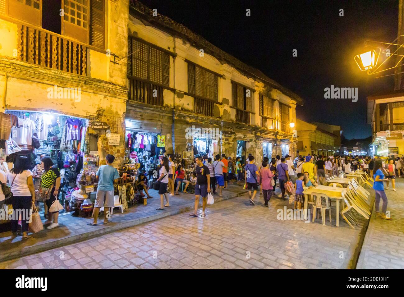 Tourists at night at Calle Crisologo in Vigan City, Philippines, a ... Tourists at night at Calle Crisologo in Vigan City, Philippines, a ...