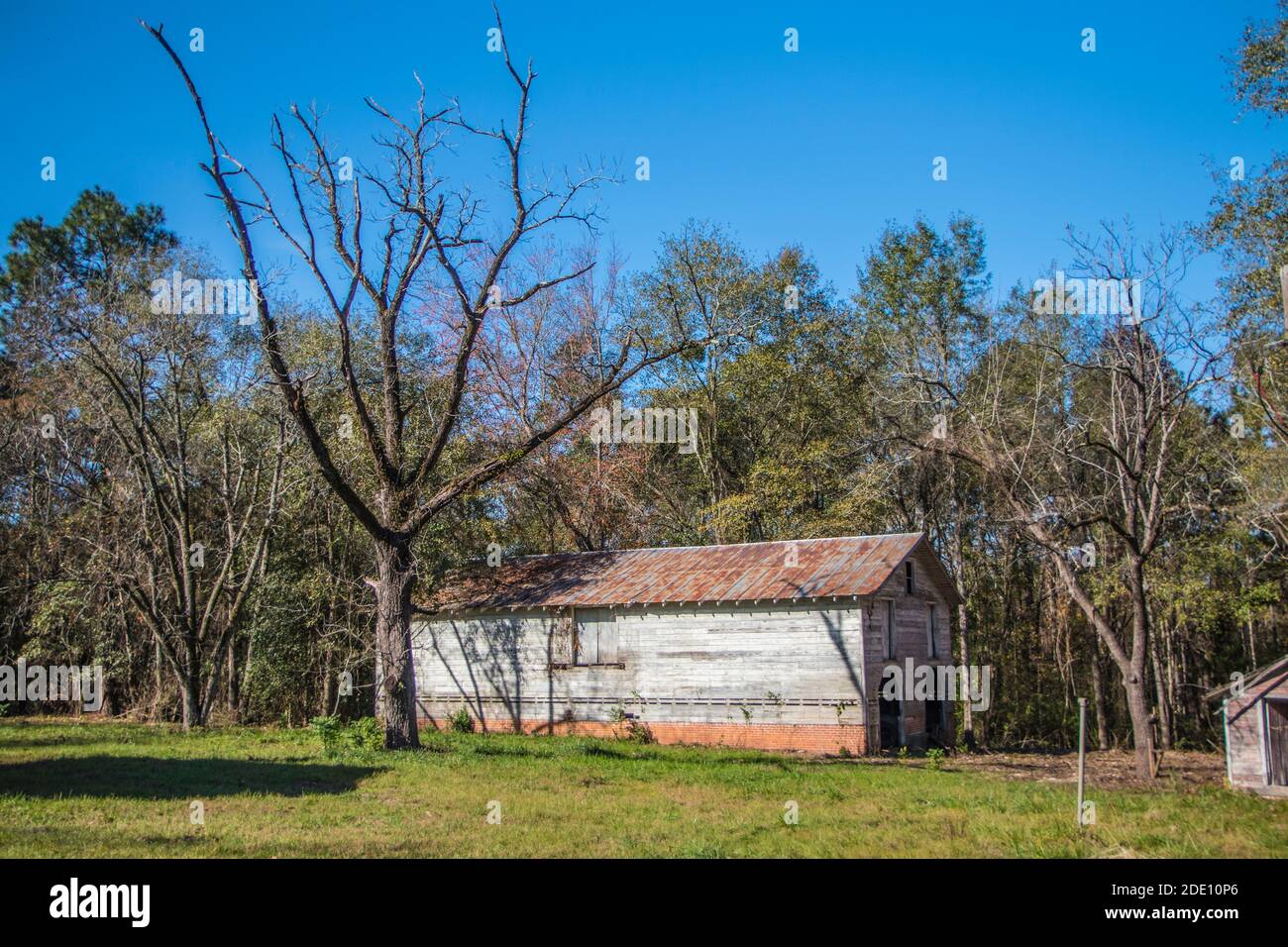 Old wooden rustic style barn in rural Georgia side corner view Stock ...