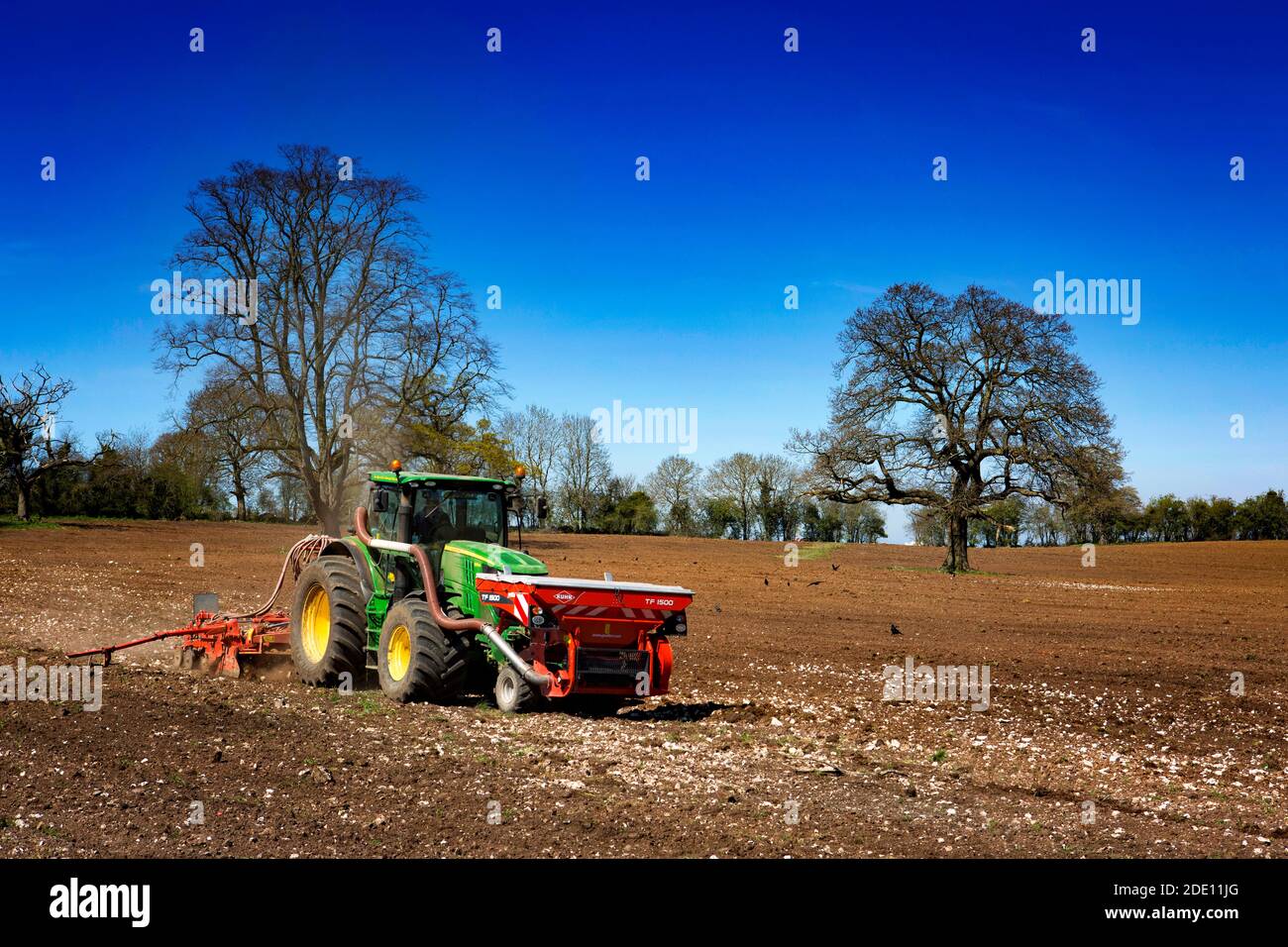 Tilling the soil in April ready for planting in Northern Ireland Stock ...